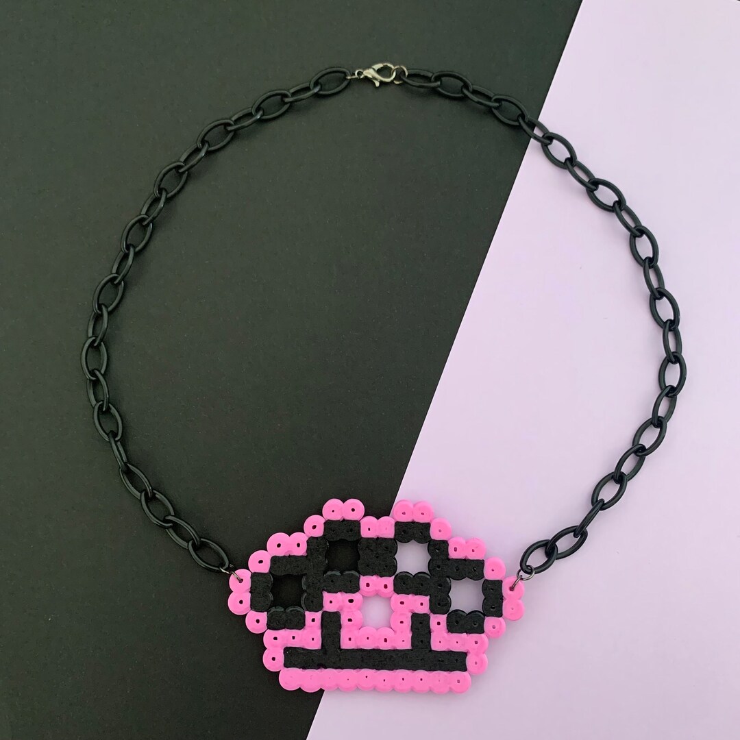 Pink Brass Knuckles Pixel Necklace - Etsy
