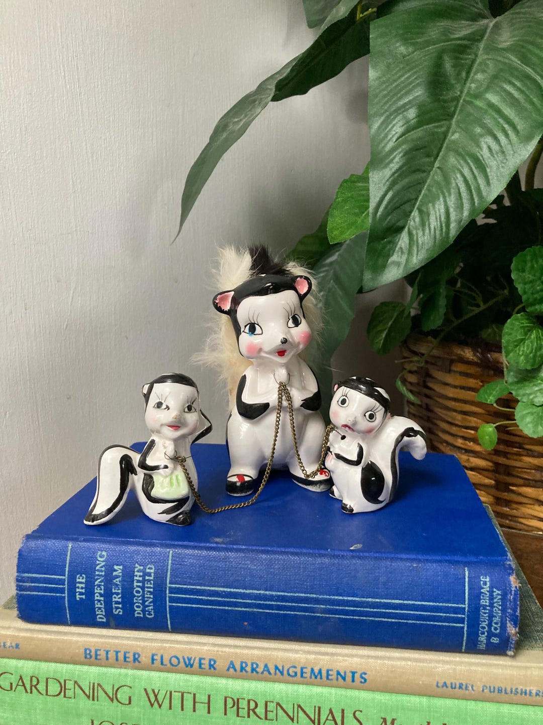 Chained Ceramic Skunk Family. C - Etsy