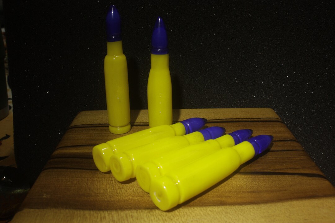 Yellow and Bright Blue Handmade Borosilicate Glass Bullets.timestamp ...