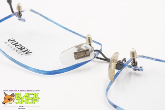 VERSACE VERSUS C19 Rimless eyeglass frame, graphite c… - Gem