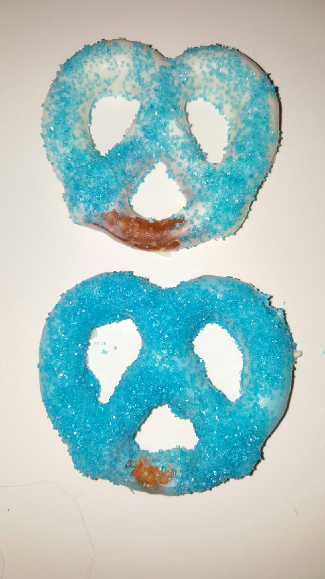 Chocolate Covered Pretzels! White Chocolate Decorated in Blue or Pink ...