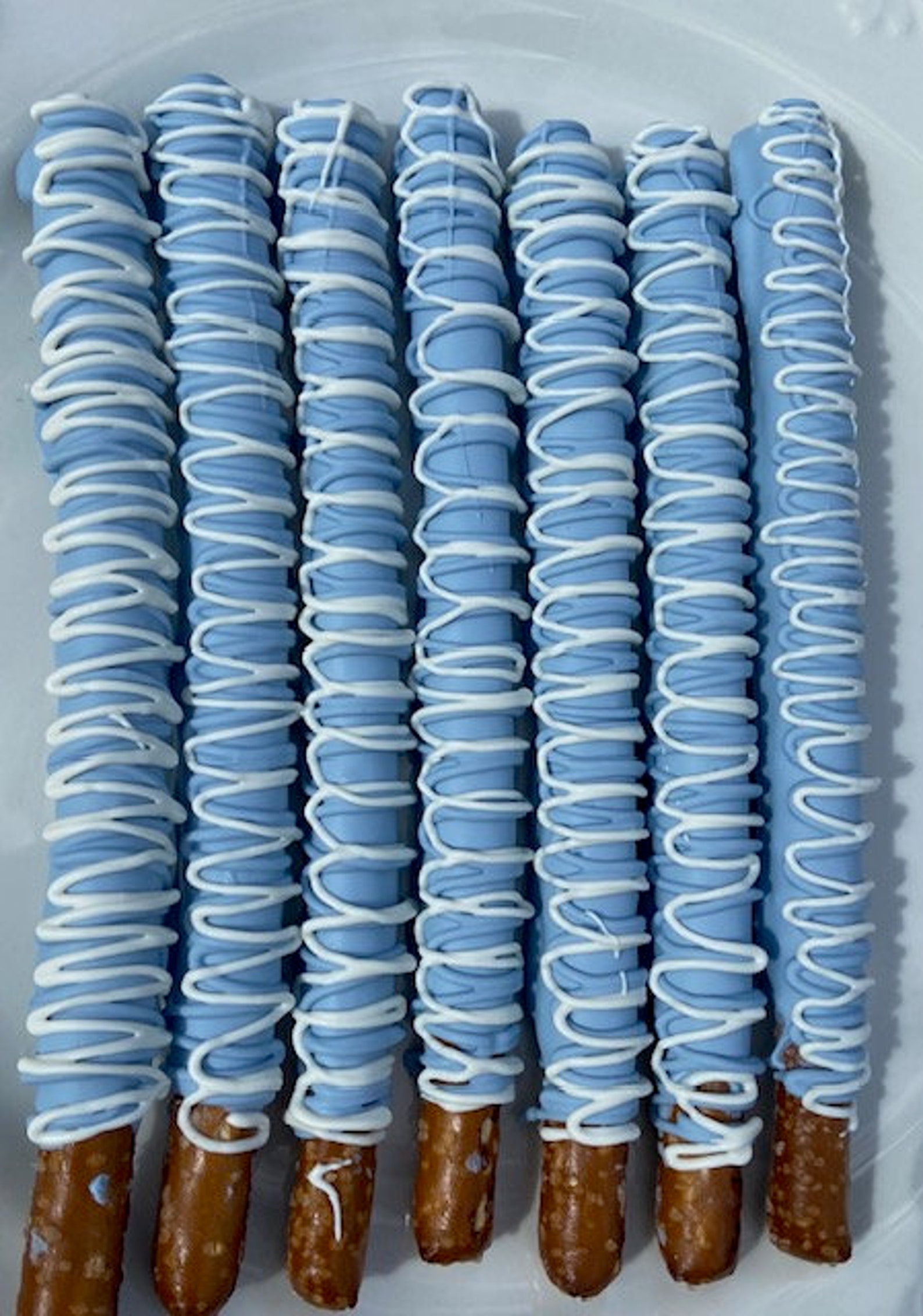 White Chocolate With Baby Blue Drizzle Covered Pretzels! Perfect for ...