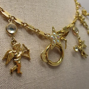 Vintage Kirks Folly Emblem Link Chain Necklace With Crystal Cupid Fairy ...