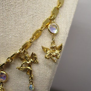 Vintage Kirks Folly Emblem Link Chain Necklace With Crystal Cupid Fairy ...