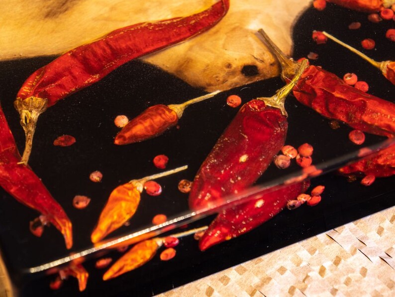 Serving Board Walnut Wood HOT RED Pepper on a Black Background in ...