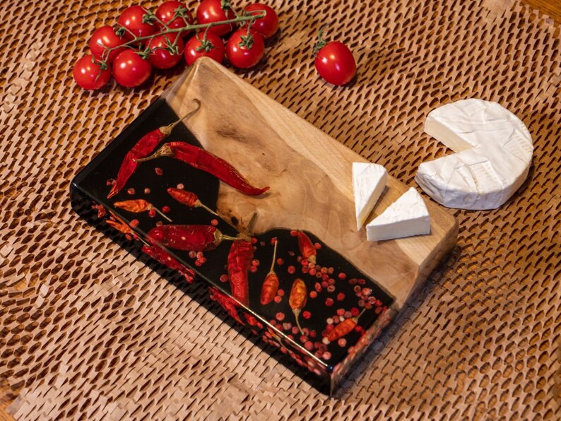 Serving Board Walnut Wood HOT RED Pepper on a Black Background in ...