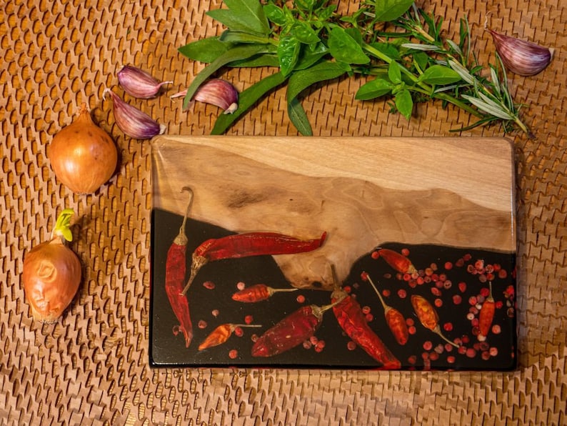 Serving Board Walnut Wood HOT RED Pepper on a Black Background in ...