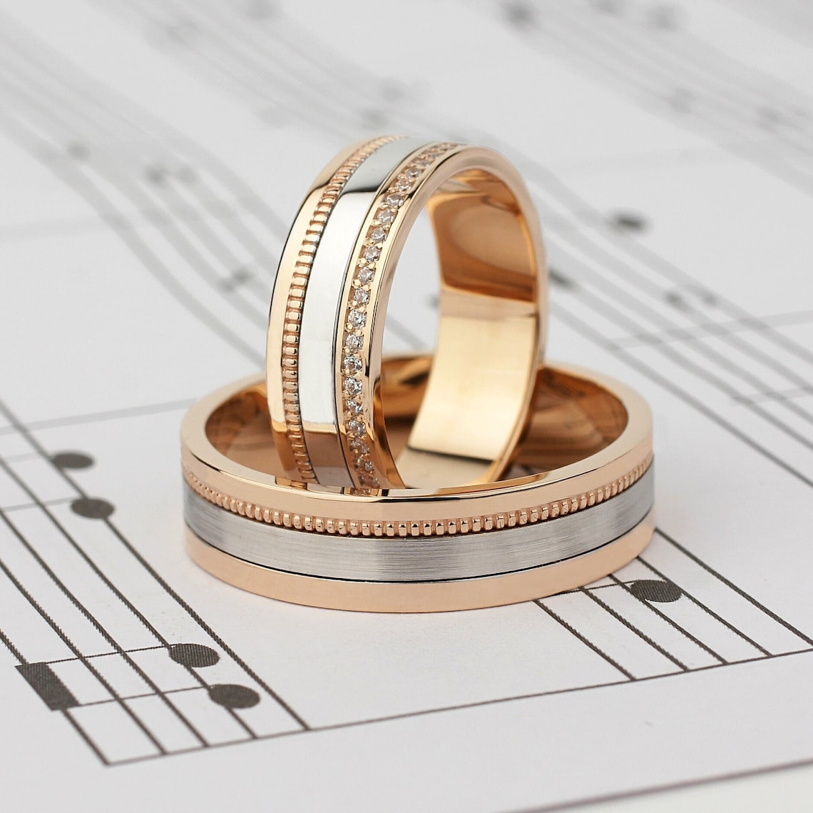 Gold wedding bands set made of two colors of gold. Unique | Etsy