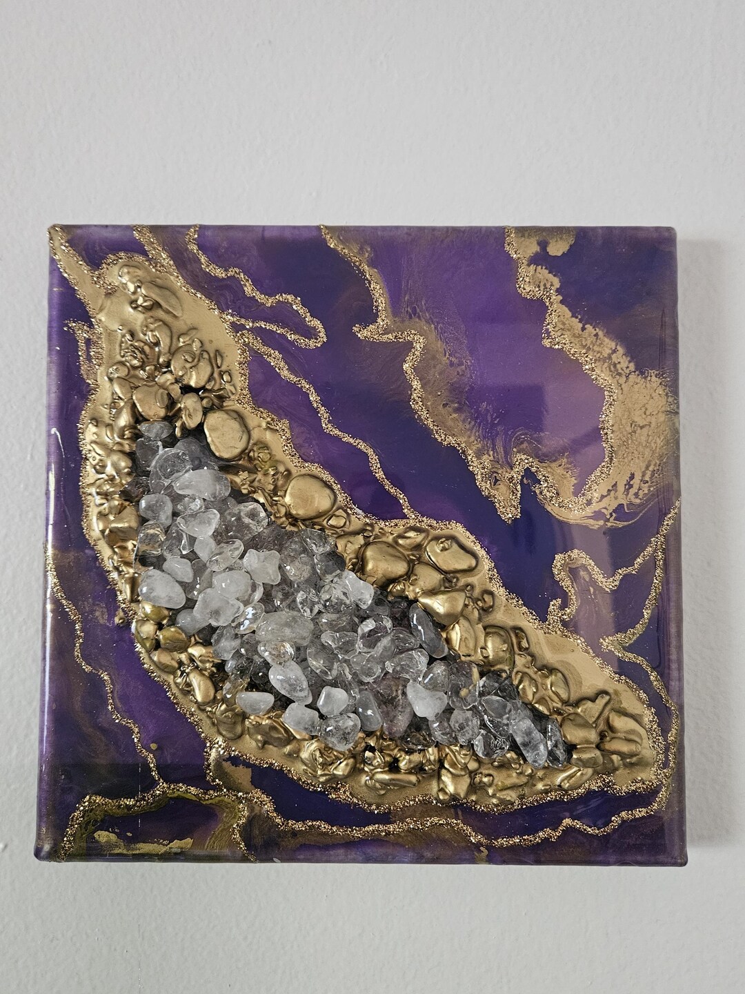 A Work of Epoxy Resin, Crafted in Shades of Purple and Gold. the Piece ...
