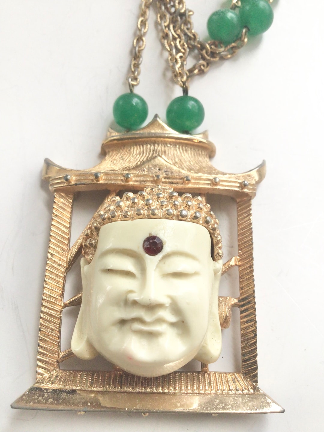 1950s Costume Jewelry Buddha Bakelite in Gold Tone Metal Temple Green ...