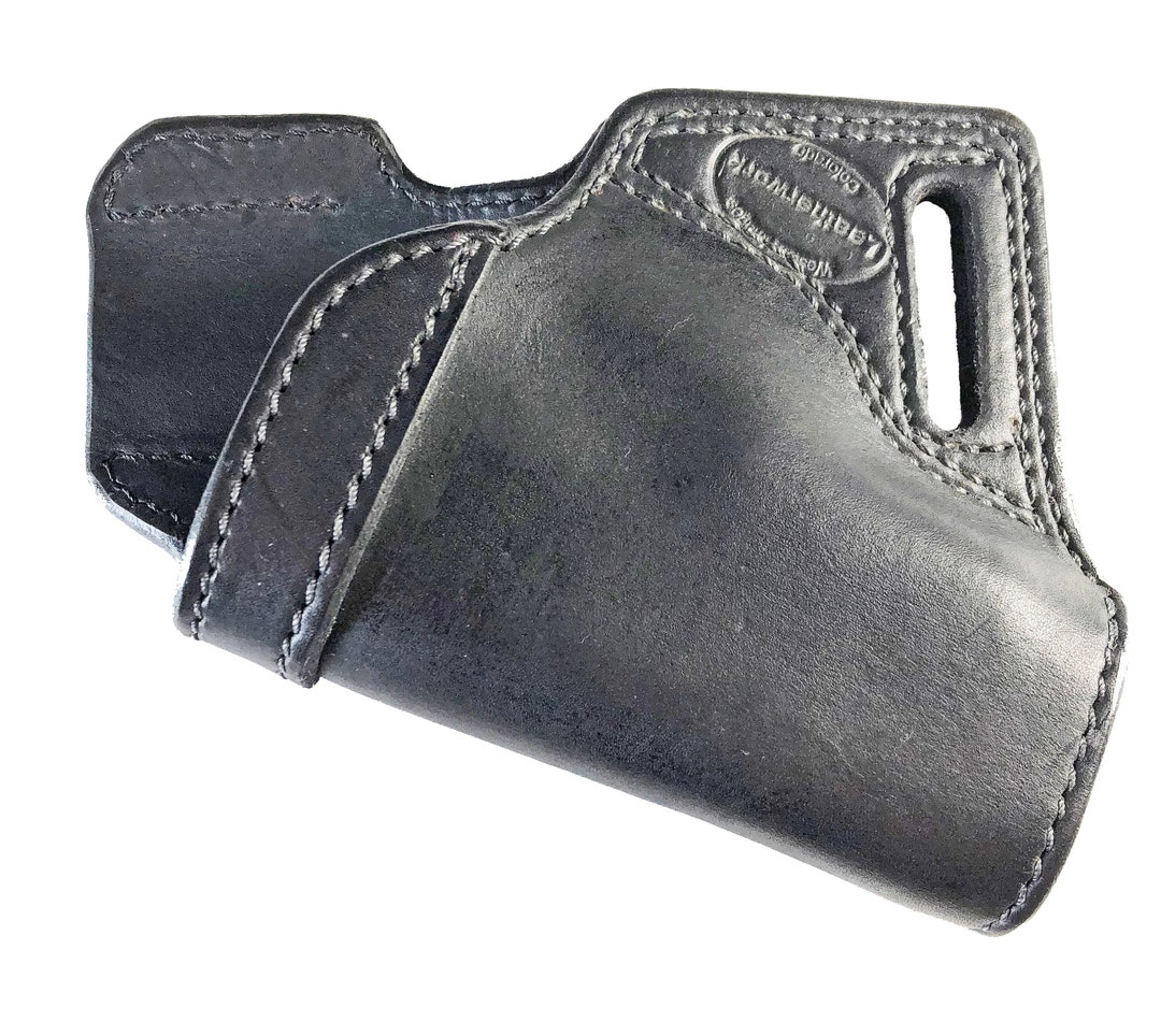 Glock 17 With Laser Small of Back Holster Outside the Waistband Left ...