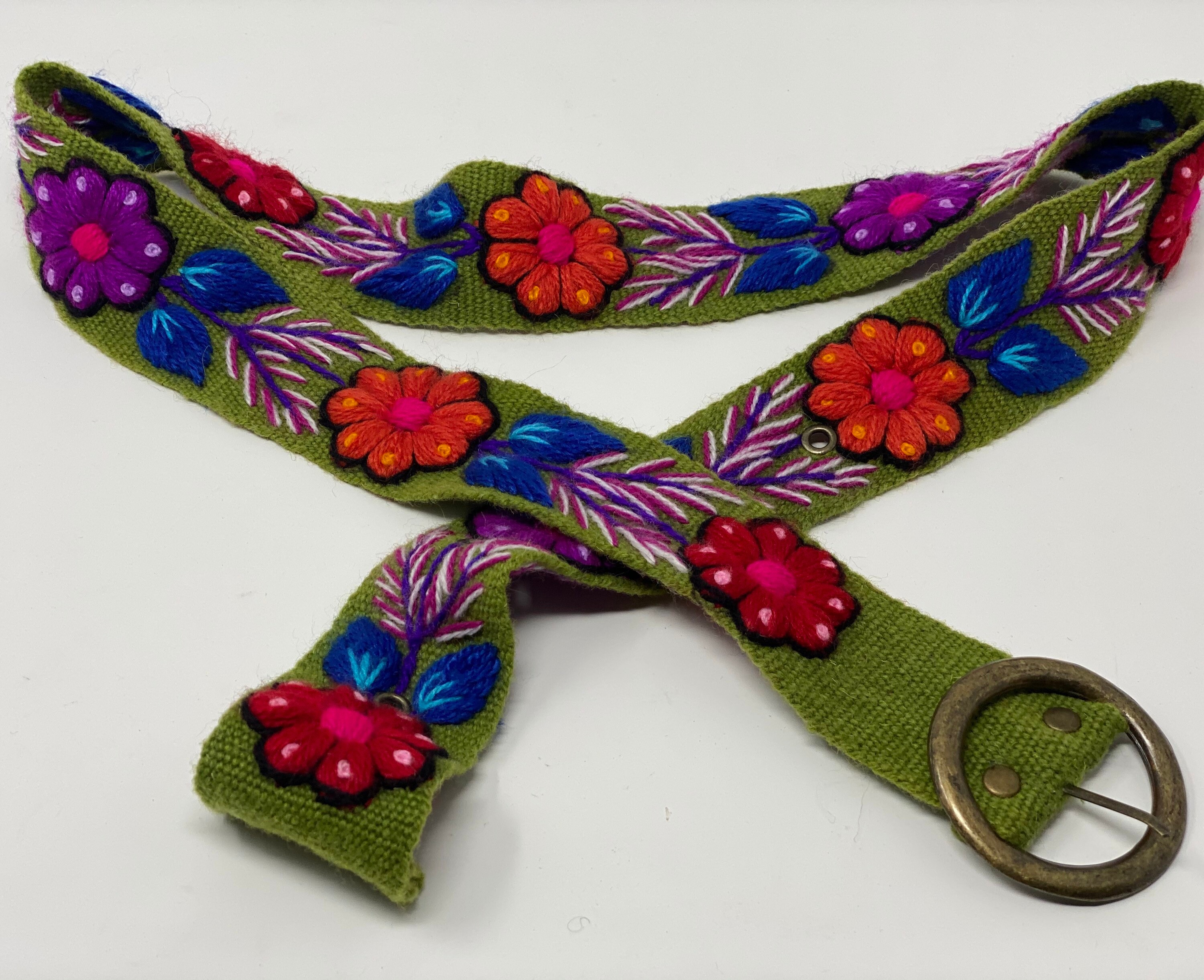 Hand embroidered wool belts from Peru