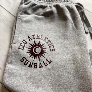 Licensed CCU Sunball Joggers, Crescent City Merch, Official SJM Merch ...