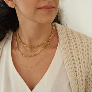 SET of THREE Gold Colour Stainless Steel Specialty Chains Necklaces ...