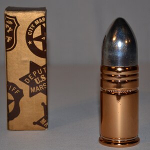 NEW IN BOX Vintage Bullet wild West Cologne Bottle Metallic Finish Rare ...