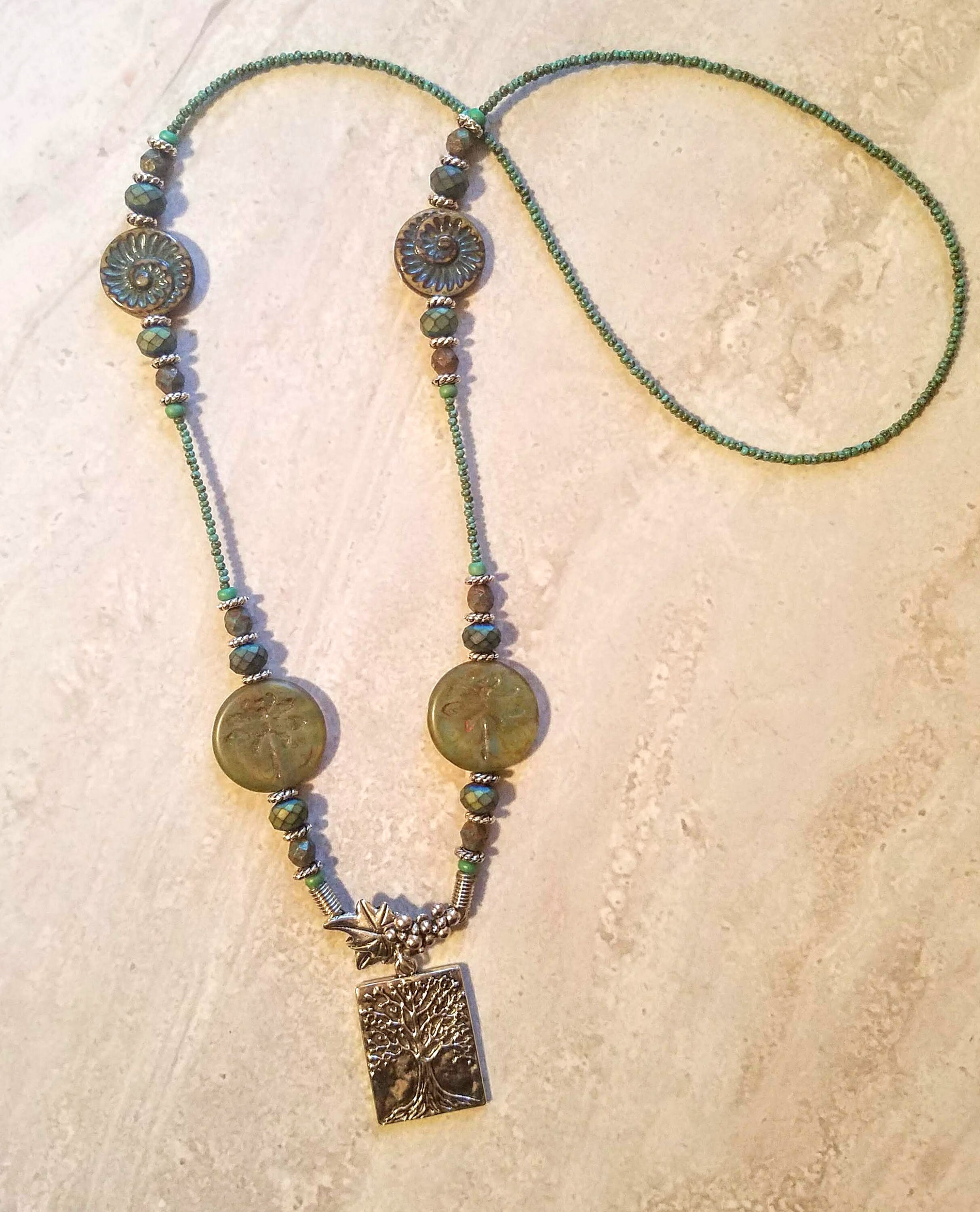 FLC Peg Montana Picasso Sea Shell Impressed Glass Beads Front - Etsy