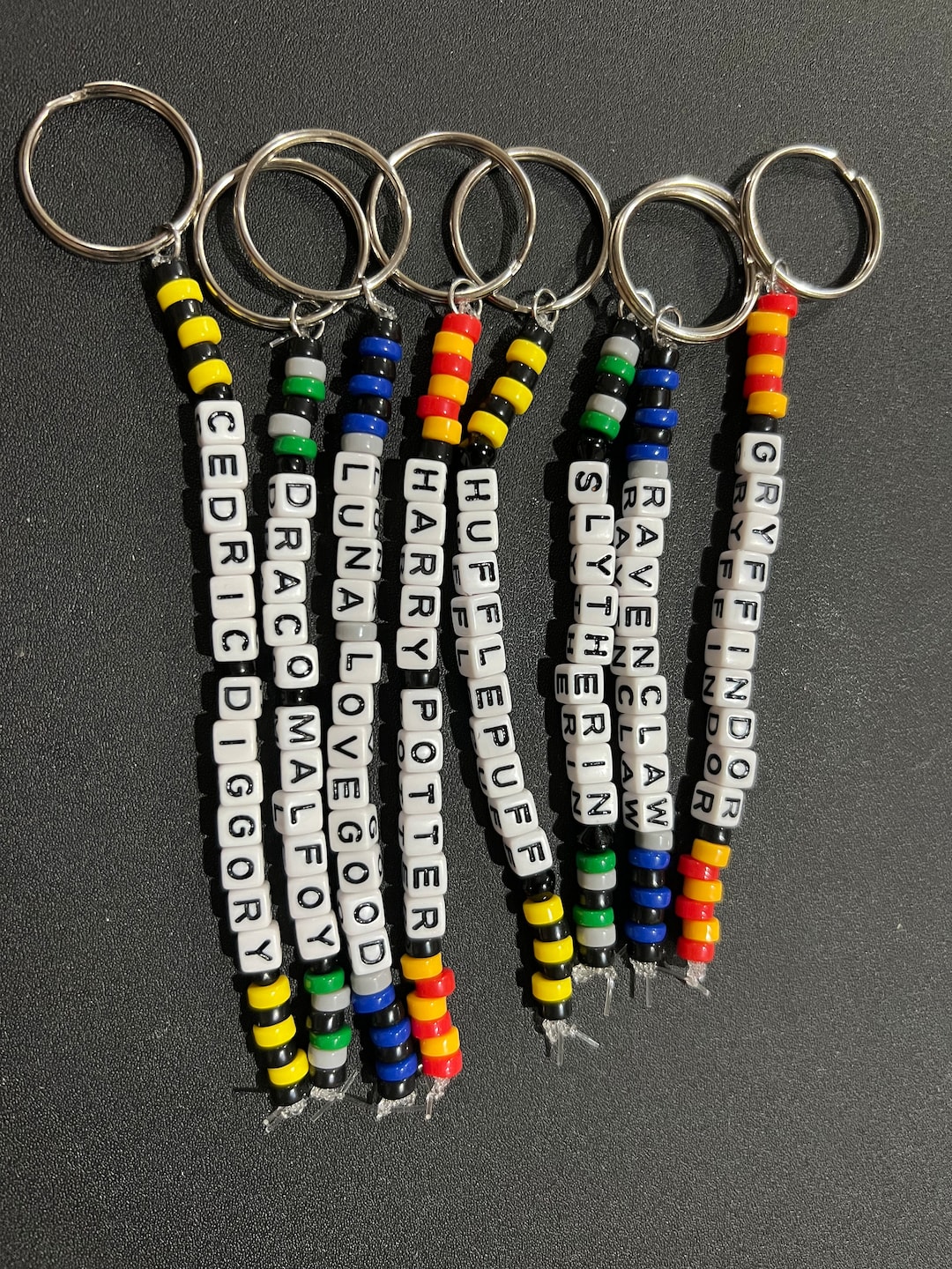 HP Wizarding World Word Keychains | Draco Malfoy | Cedric | Luna ...