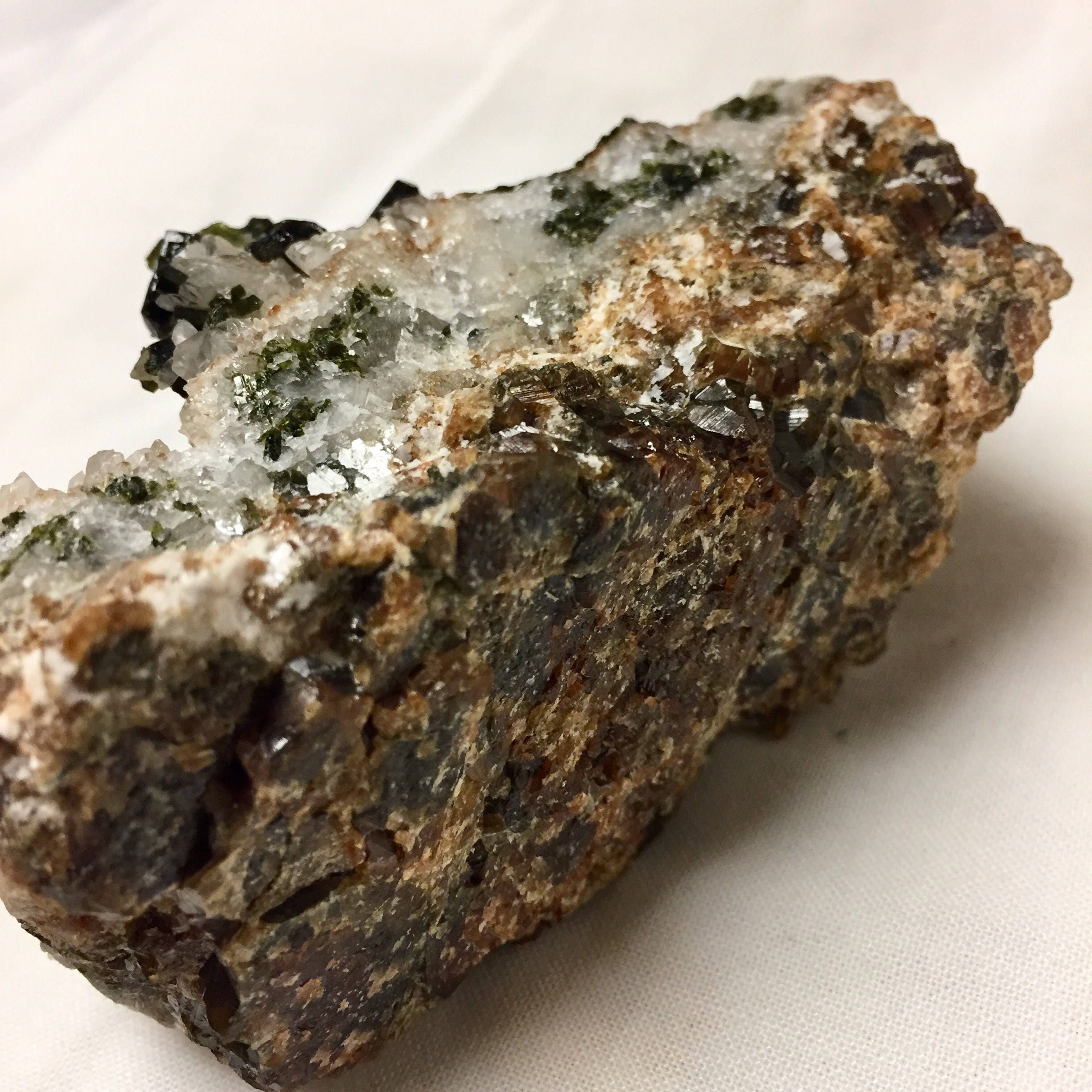 Gemmy Epidote cluster on Calcite matrix specimen