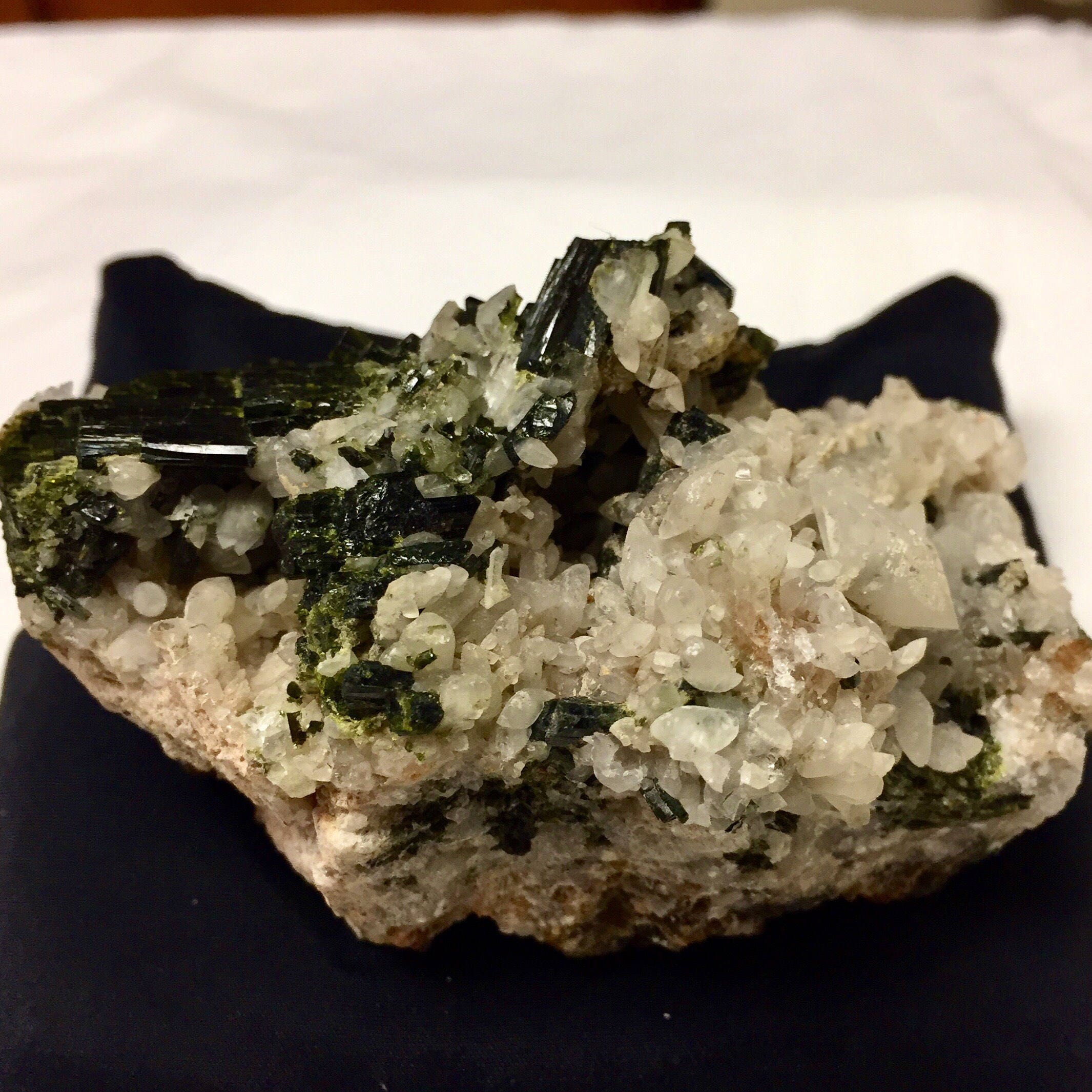 Gemmy Epidote cluster on Calcite matrix specimen