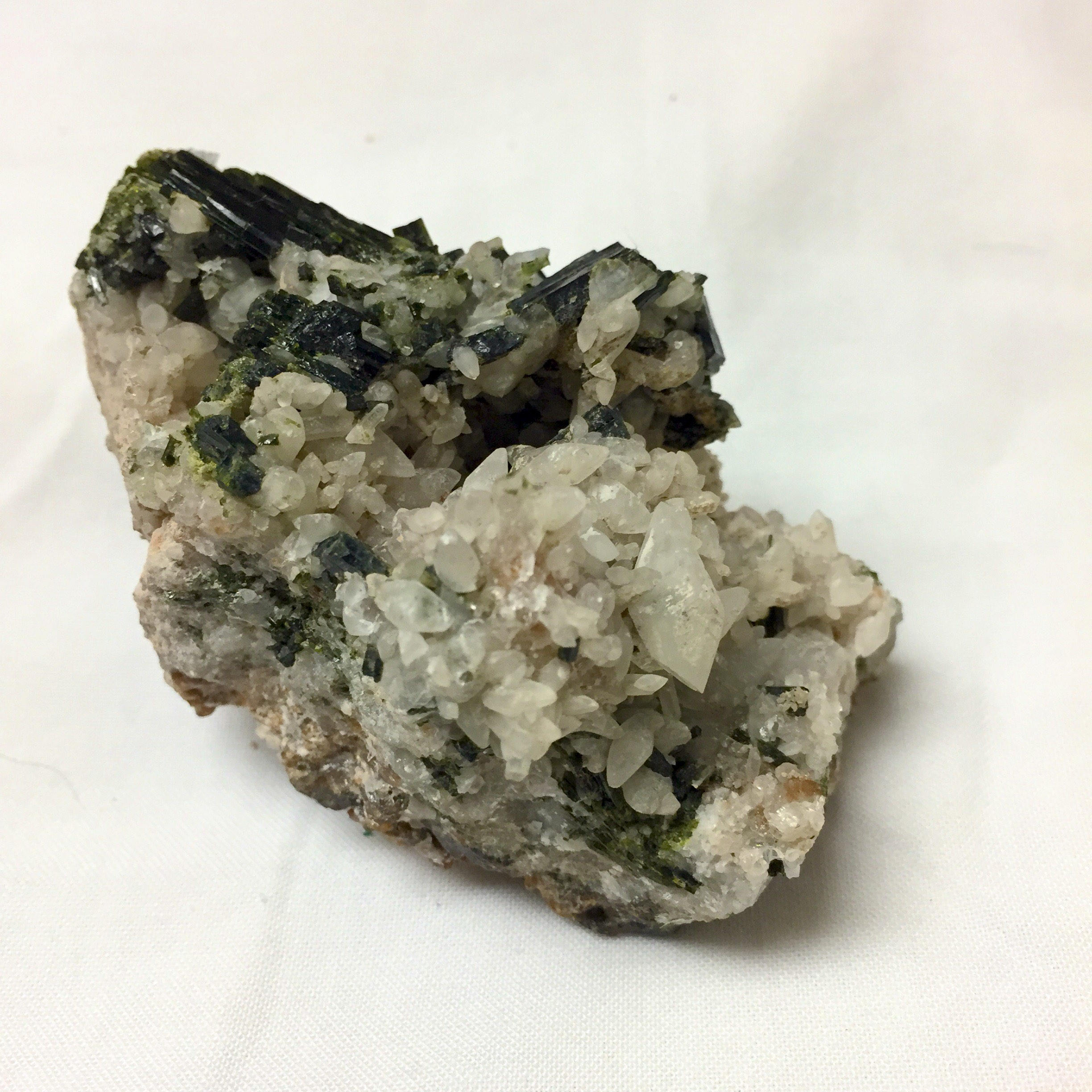 Gemmy Epidote cluster on Calcite matrix specimen