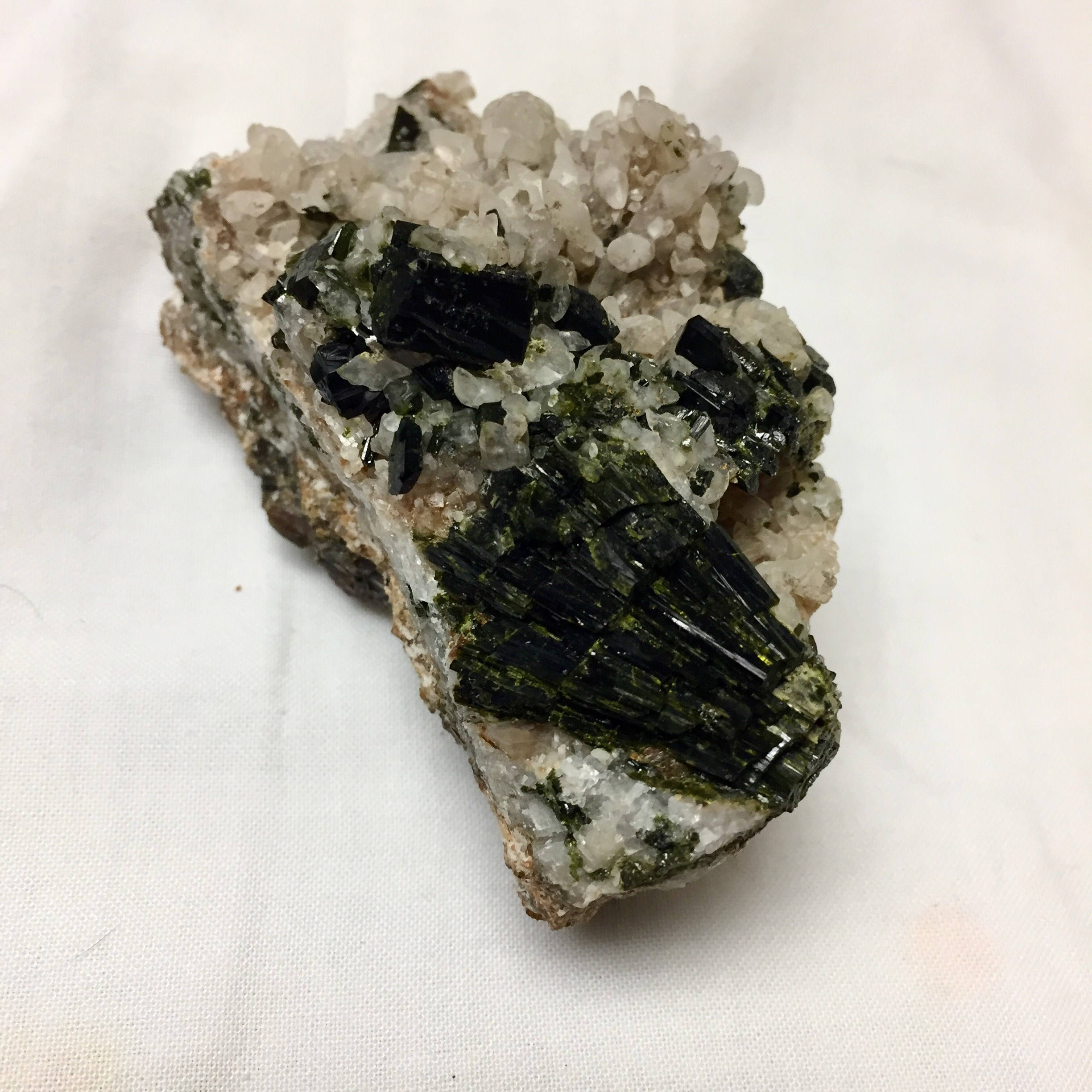 Gemmy Epidote cluster on Calcite matrix specimen
