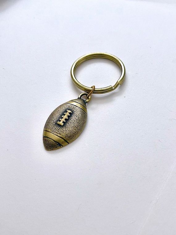 Gold/bronze-tone football sports fan keychain - Gem