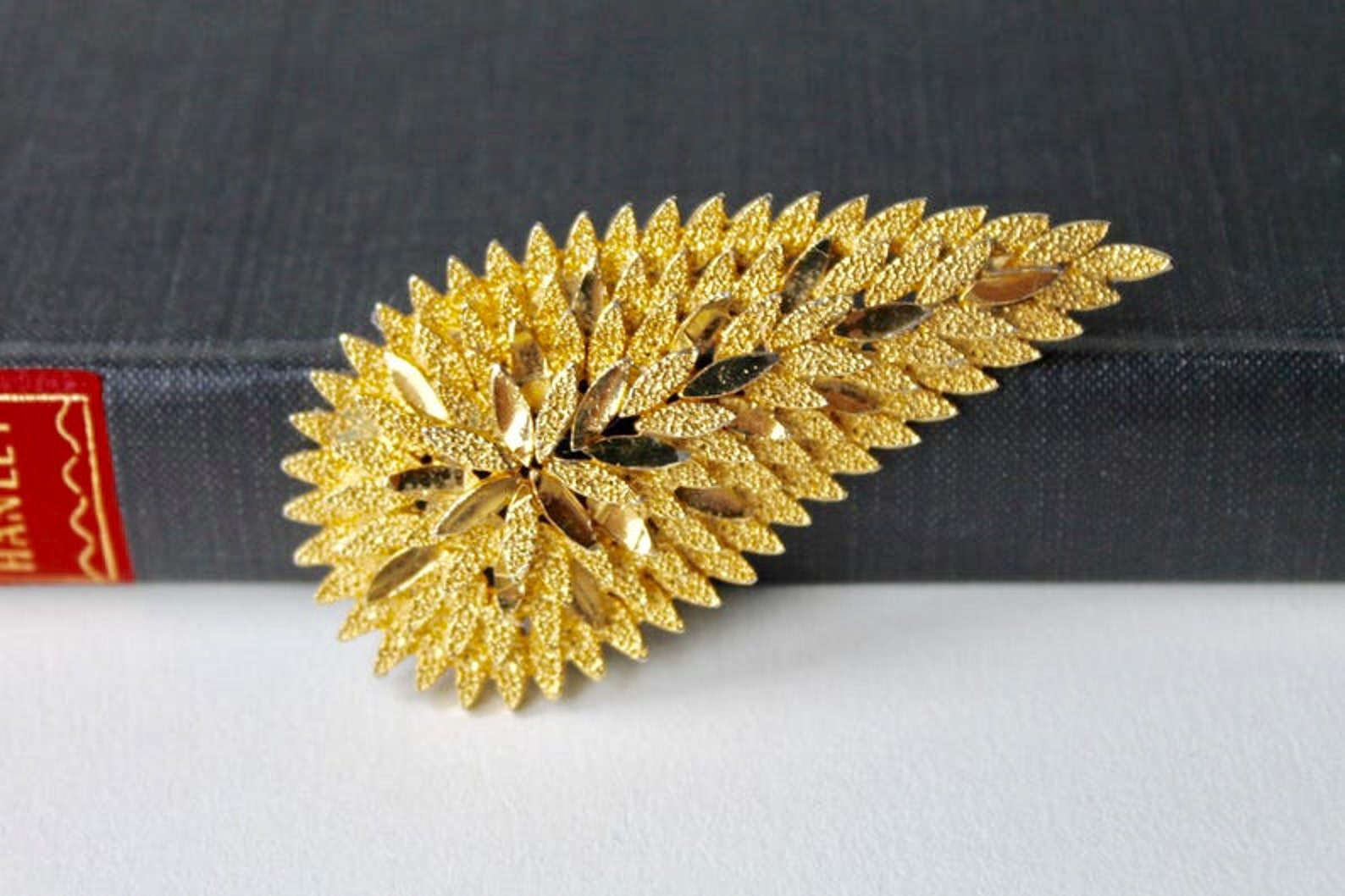 Vintage Sphinx gold tone textured Paisley brooch. Sphinx leaf | Etsy