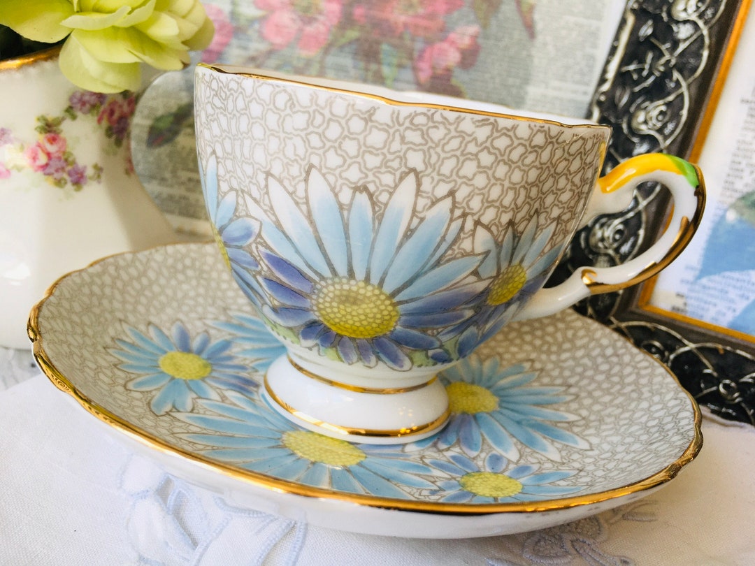 Tuscan Blue Daisies Teacup and Saucer, Yellow and Green Handle ...