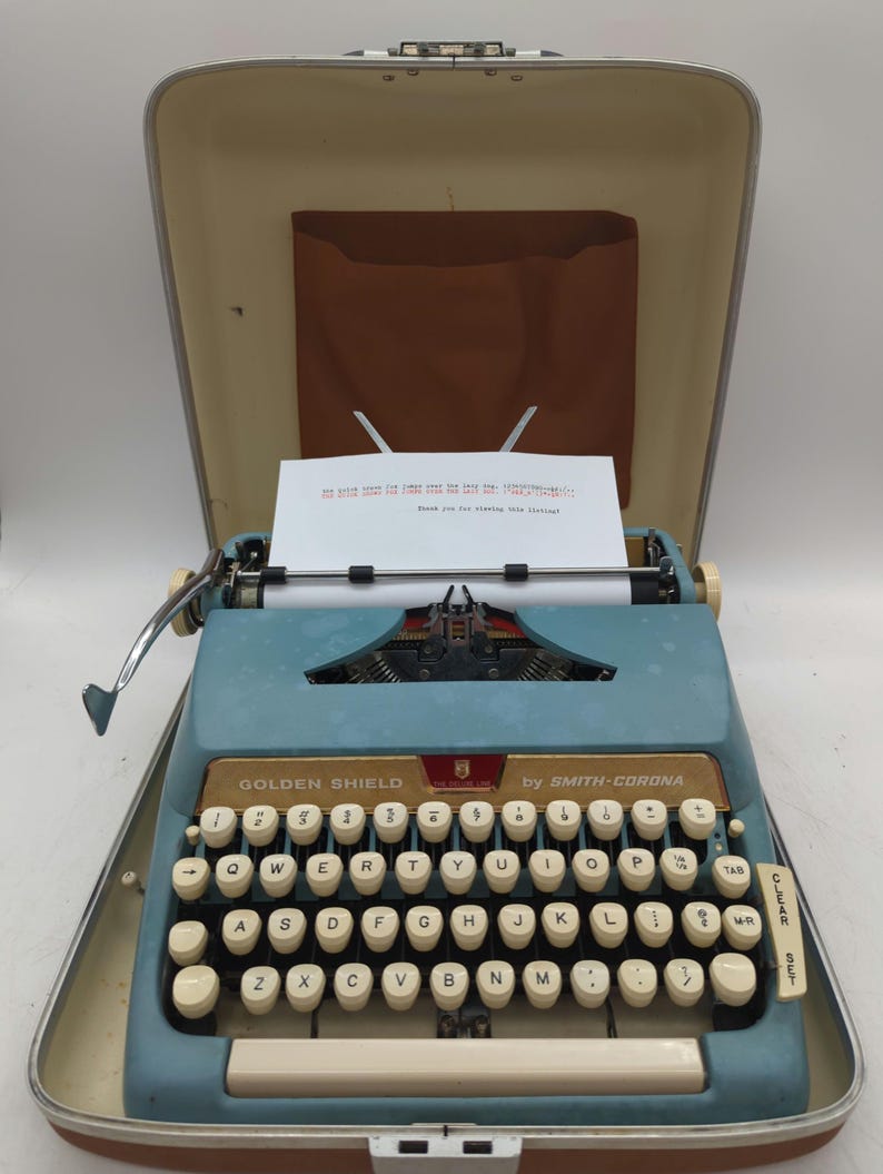 Máquina de escribir Smith Corona Golden Shield de los años 60, azul y ...