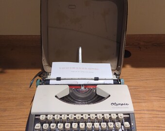 1962 Olympia SF Ultra Portable Manual Typewriter With Carrying Case - Etsy