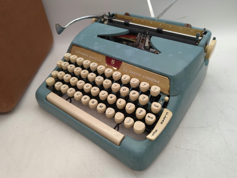 Máquina de escribir Smith Corona Golden Shield de los años 60, azul y ...