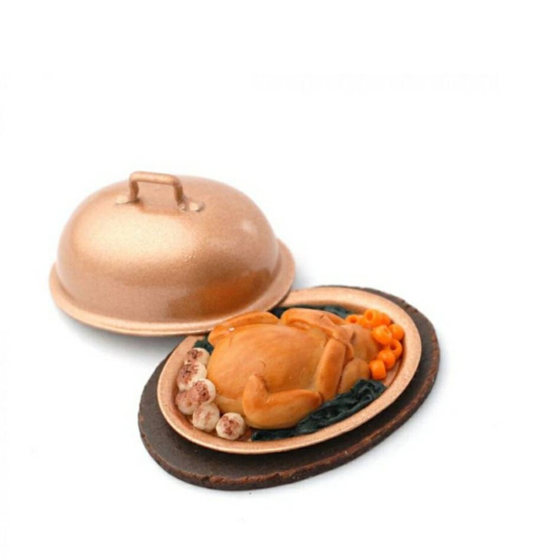 Baked Turkey and Vegetables Covered With a Copper Coloured Cloche 1 ...