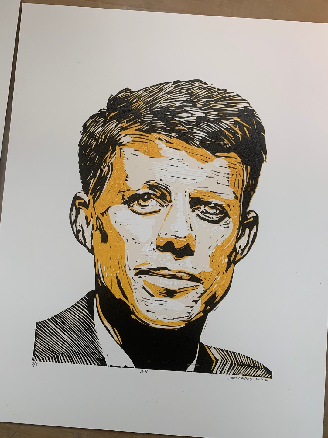 John F Kennedy in Gold and Black, a Linocut Print by Tom Callos in a ...