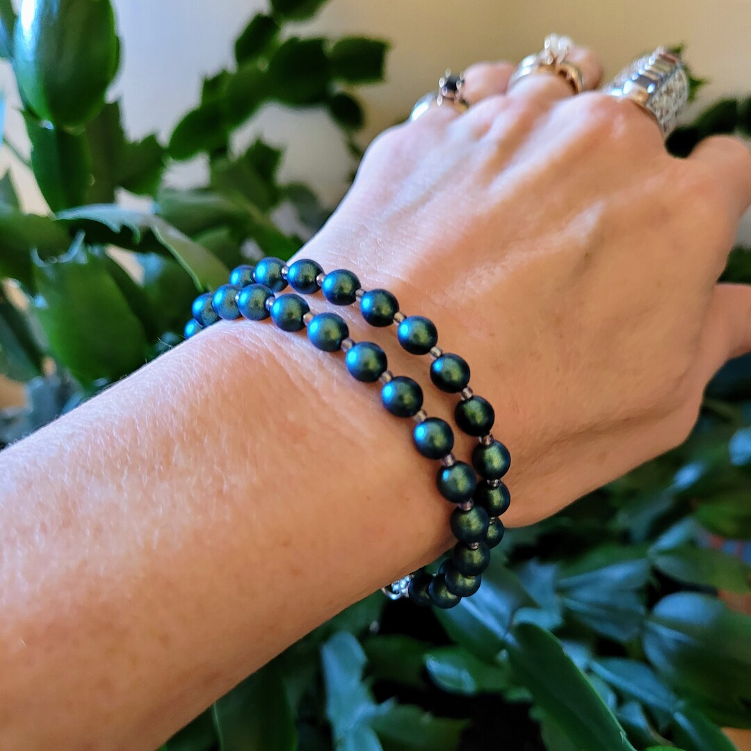 Bracelet of Shimmering Green Glass Pearls a Double Strand With ...