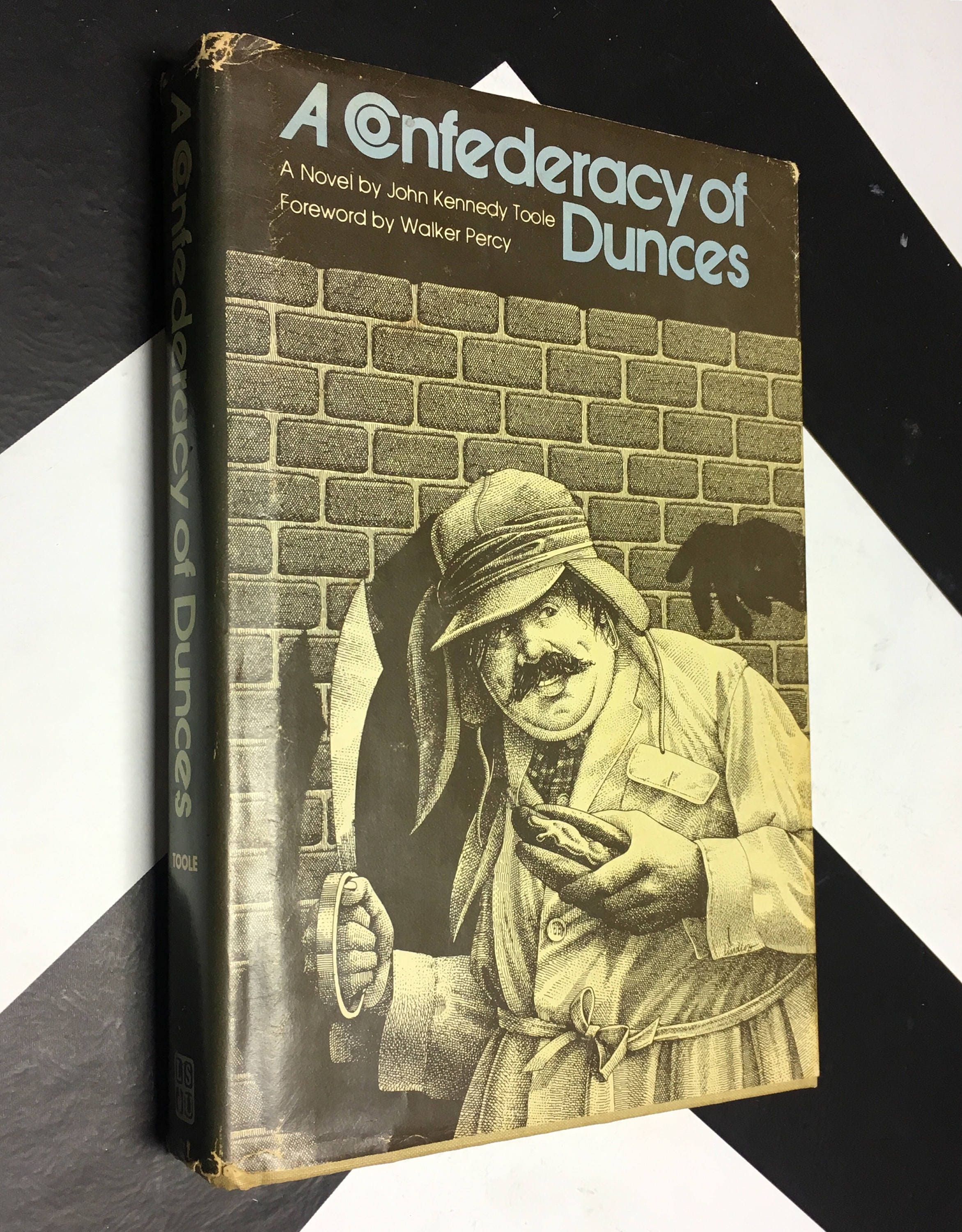 A Confederacy of Dunces by John Kennedy Toole (1980) A Confederacy of Dunces by John Kennedy Toole (1980)