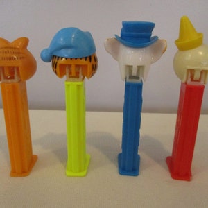 Lot of 8 Pez Dispensers,garfield Pez,clown Peter Pez,jack in the Box ...