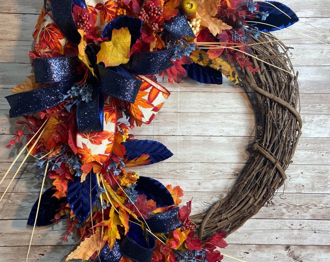 Beautiful Navy Blue, Fall Colored Leaves and Berries on Rustic Vine ...