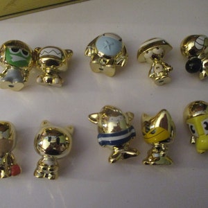 Gogos Crazy Bones the Gold Series Collection of Ten Gold Gogos in Tin ...