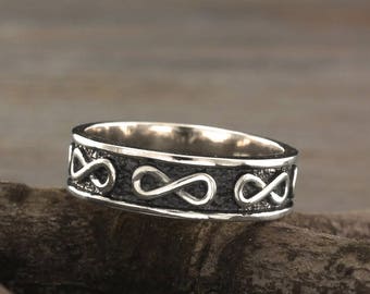 Mens infinity ring | Etsy