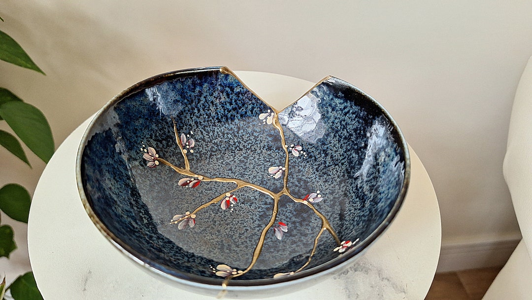 Broken and Repaired Kintsugi on Ceramic Bowl Made in Japan. Hand ...
