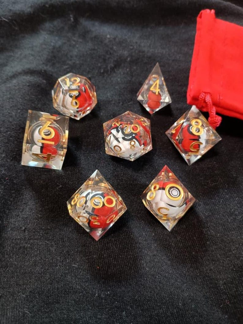 Set of 7 Premium Rolling Poké Ball Liquid Core Dice Flowing Snow Globe ...