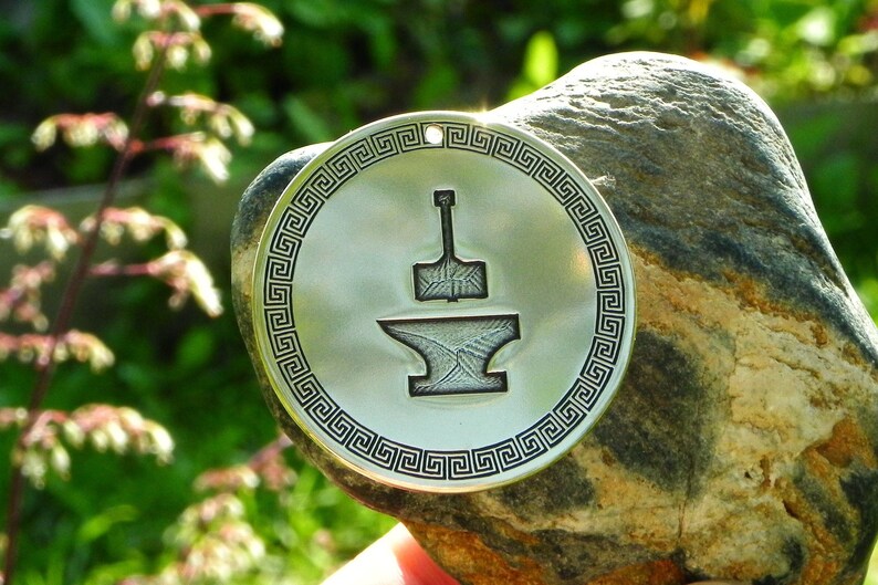 Symbol of the Greek God Hephaestus. God of fire metalworking | Etsy