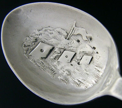 A very imaginatively designed WWI era sterling silver rifle shooting spoon.