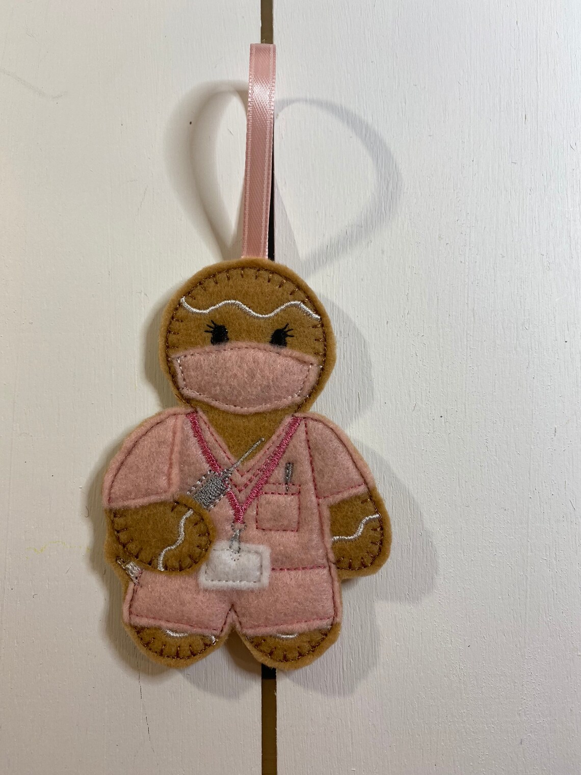 Masked Nurse Practioner Ginger in Scrubs/gingerbread Man Hanging ...