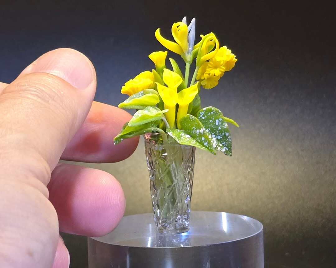 Four Types of Clay Flowers Made From Thai Clay, Placed in a Glass Vase ...