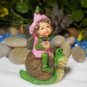 Miniature Fairy on Pet Snail Little Flower Fairy Figurine on Giant ...