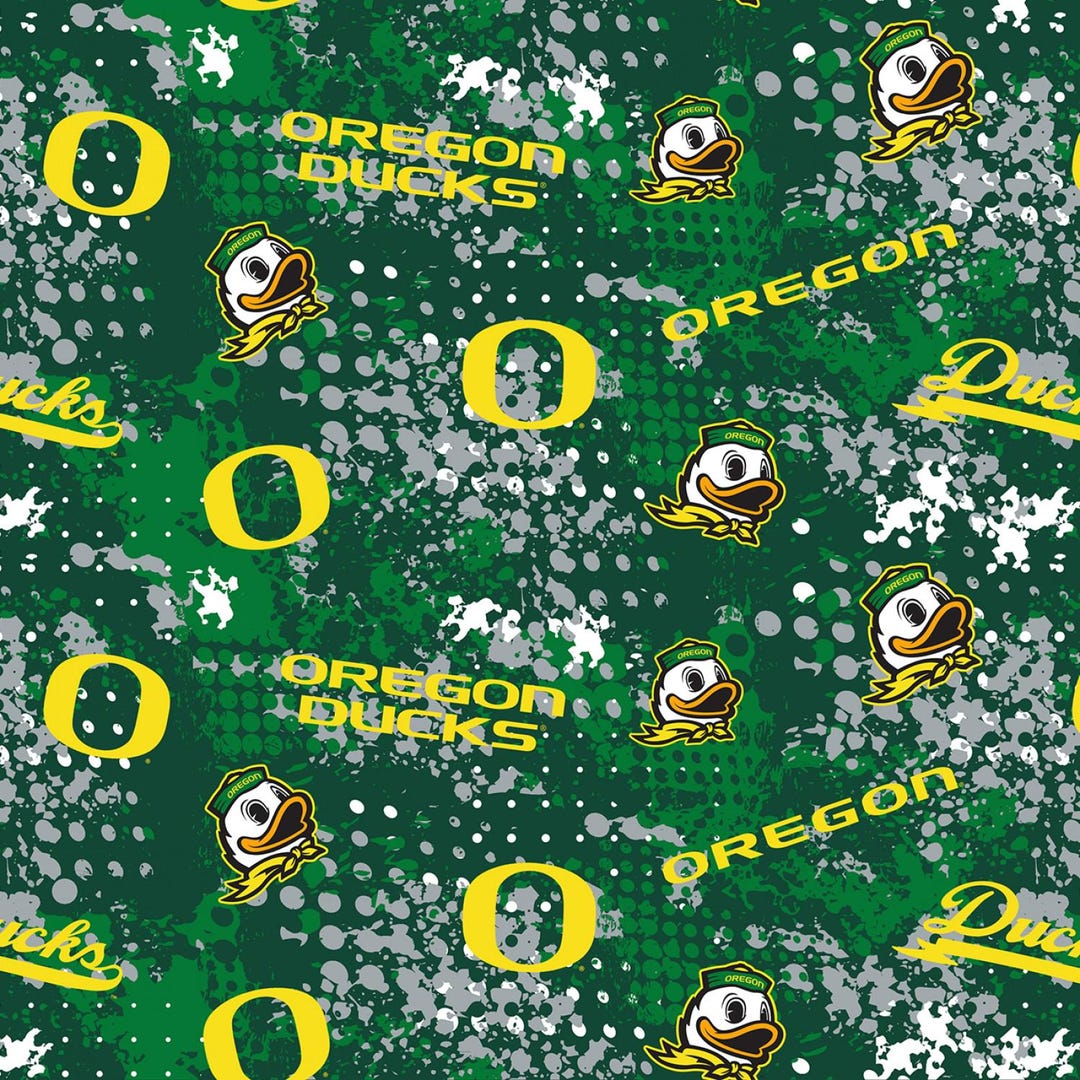 NCAA OREGON Duckss Splatter Print Football 100% Cotton Fabric Material ...