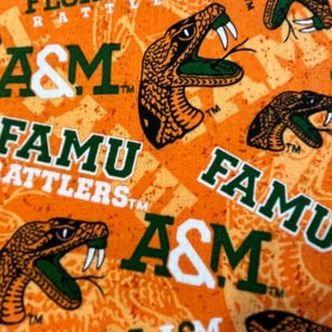 NCAA FLORIDA A&M RATTLERS Watermark Print Football 100% Cotton Fabric ...