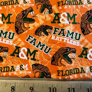 NCAA FLORIDA A&M RATTLERS Watermark Print Football 100% Cotton Fabric ...