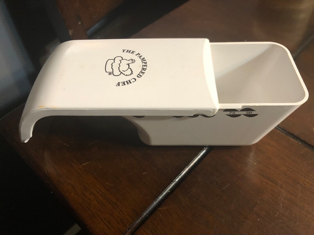 The Pampered Chef Adjustable Dry Measuring Cup Quarter Half Whole White ...